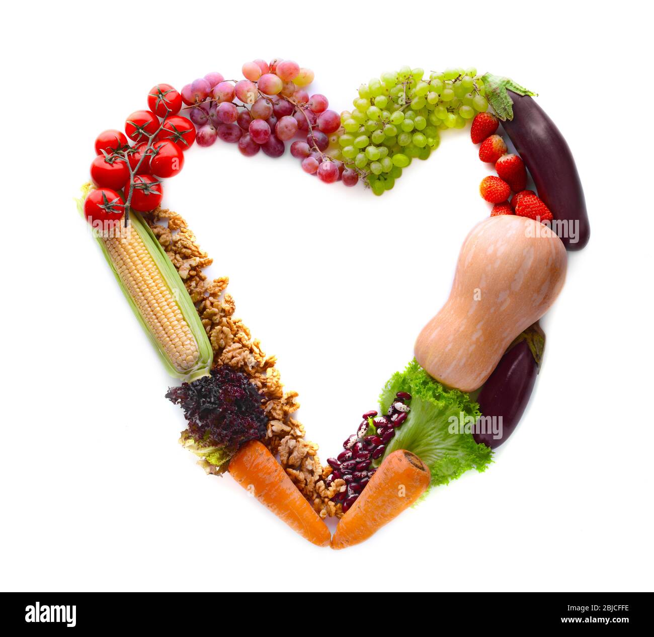 Heart made of healthy food on white background Stock Photo - Alamy