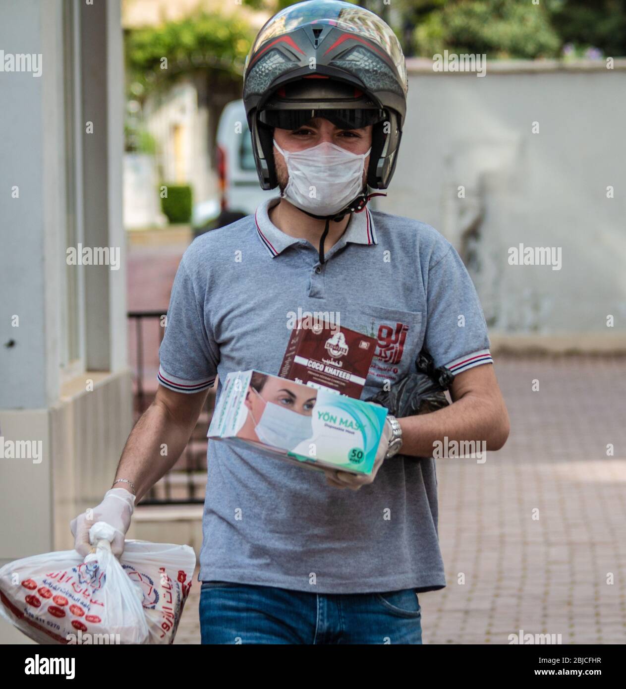 April 17, 2020, TÃ¼Rkiye, Turkey: A Syrian delivery agent wearing a ...