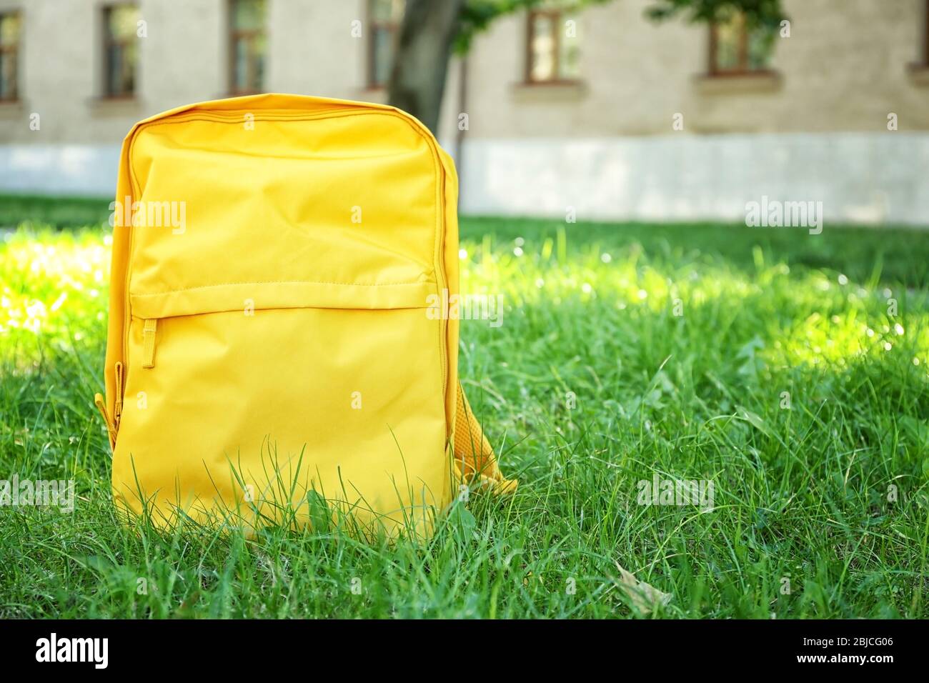 Yellow rucksack hi-res stock photography and images - Alamy