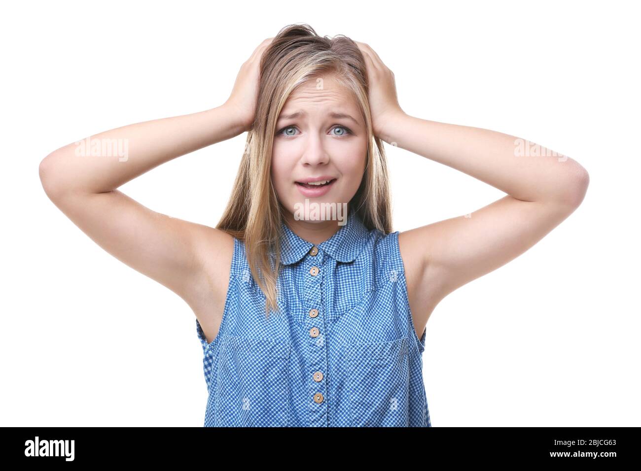 Confused teenager girl isolated on white Stock Photo - Alamy