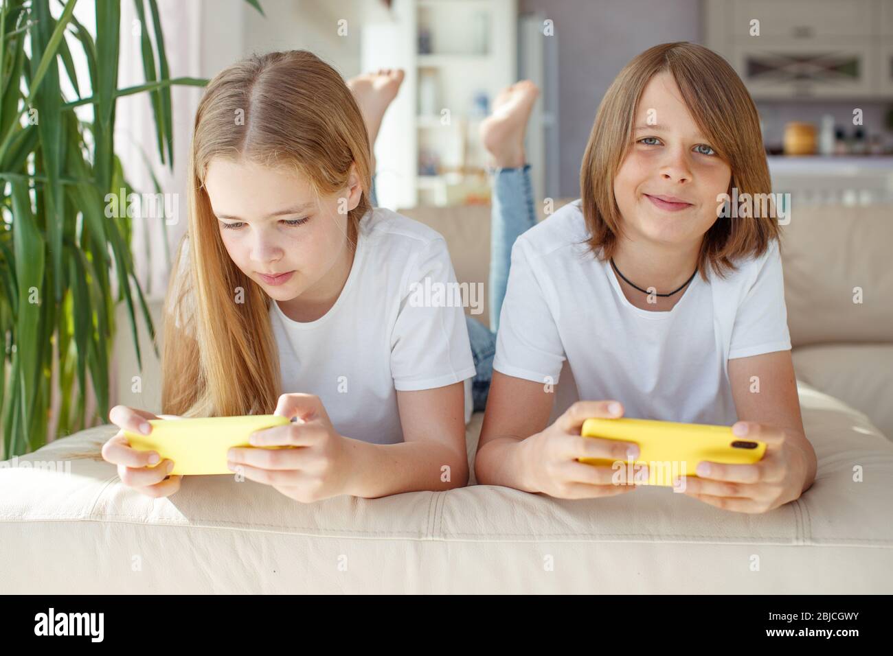 Children play at home Stock Photo - Alamy