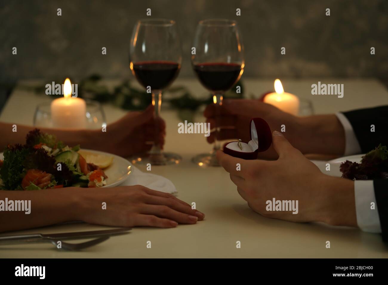 Wedding proposal in restaurant Stock Photo - Alamy