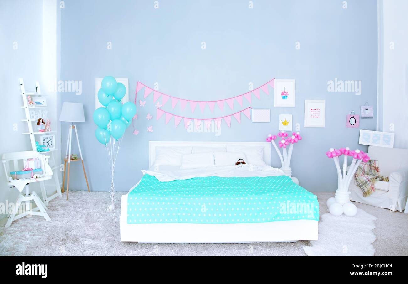 Beautiful interior of child's room decorated for birthday celebration ...