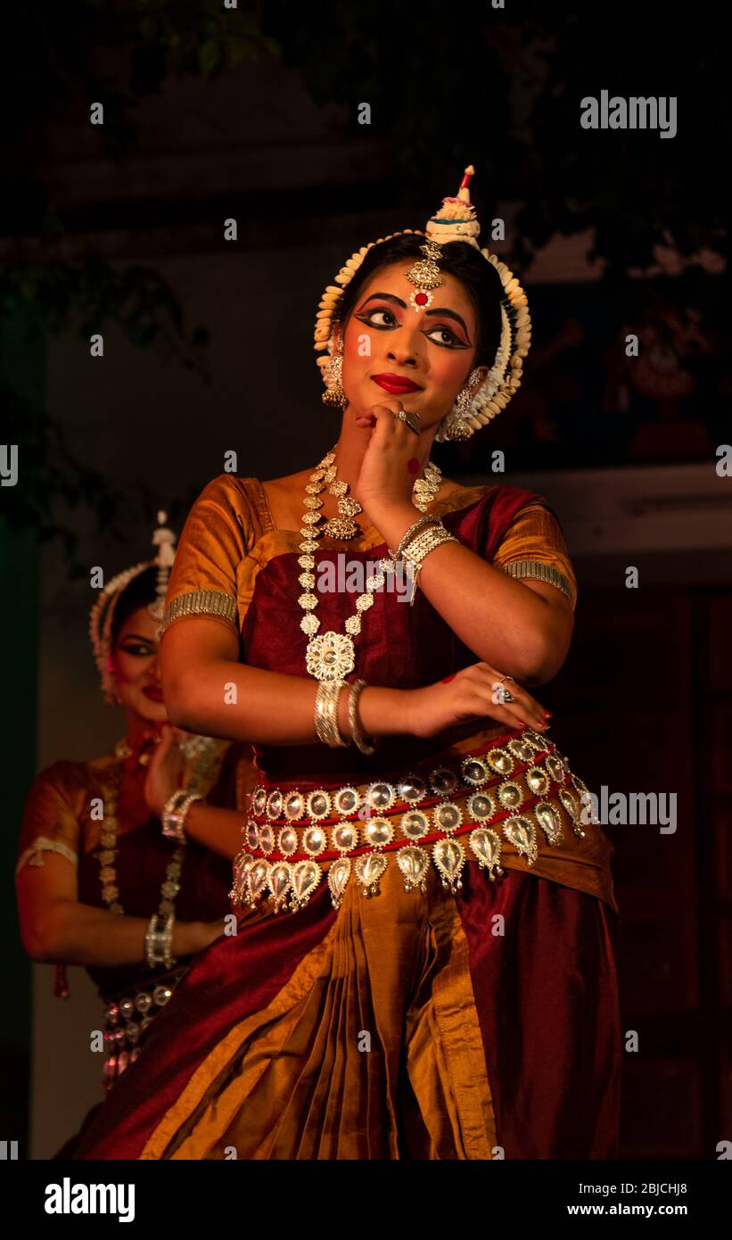 Young female artists performing famous classical "Odissi" dance form in ...