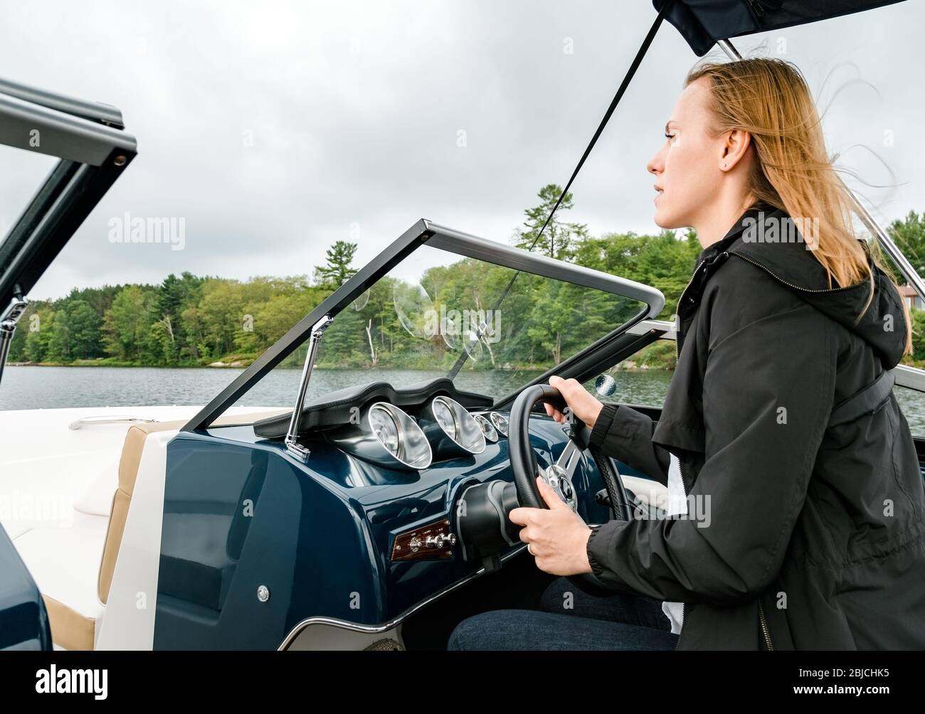 Woman wheel boat hi-res stock photography and images - Alamy