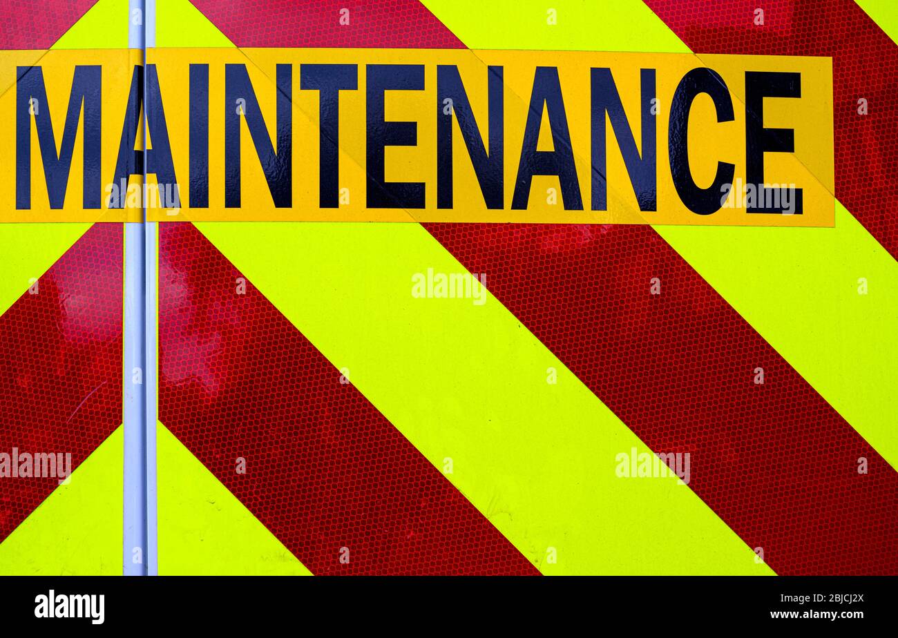 Maintenance Sign on Van - UK Stock Photo - Alamy