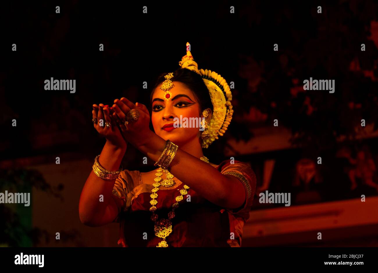 Young female artists performing famous classical "Odissi" dance form in ...