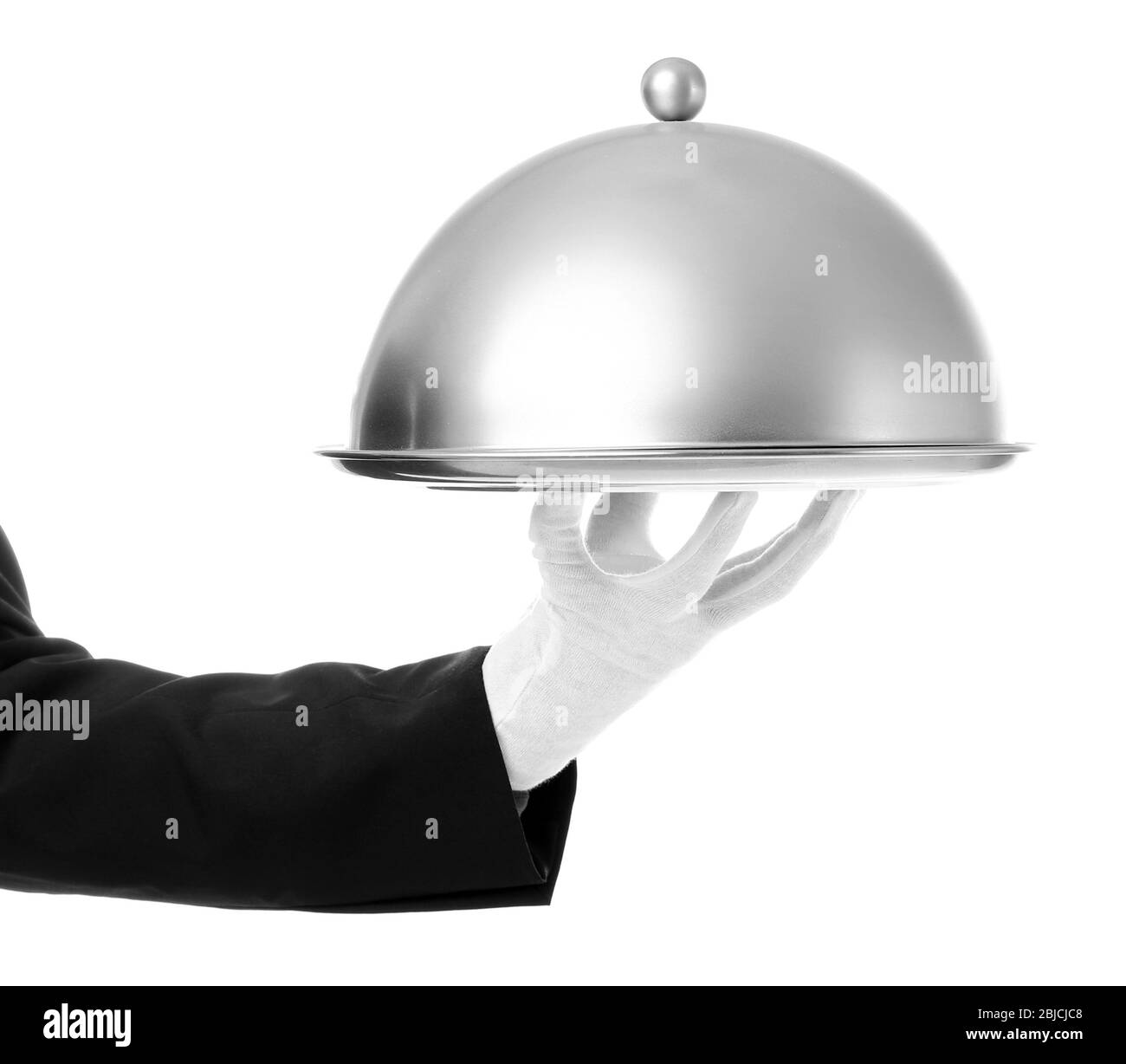 Waiter hand with cloche and tray on white background Stock Photo - Alamy