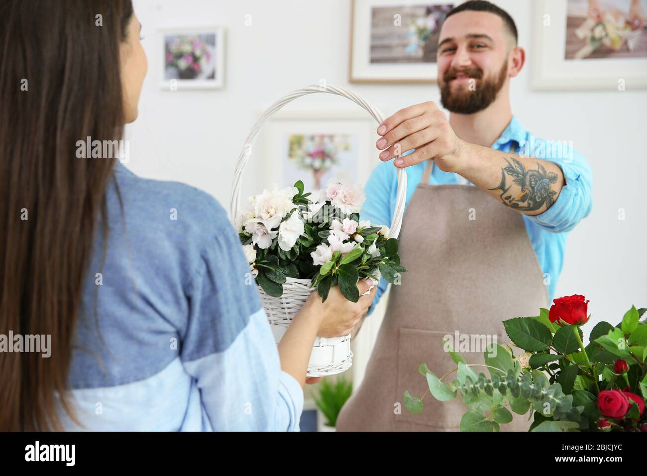 Handsome florist making bouquet hi-res stock photography and images - Alamy