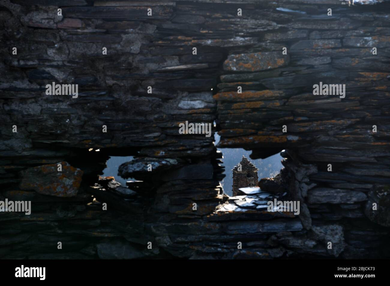 Caucasus, Georgia, Tusheti region, Kvavlo. Kvavlo medieval tower framed ...