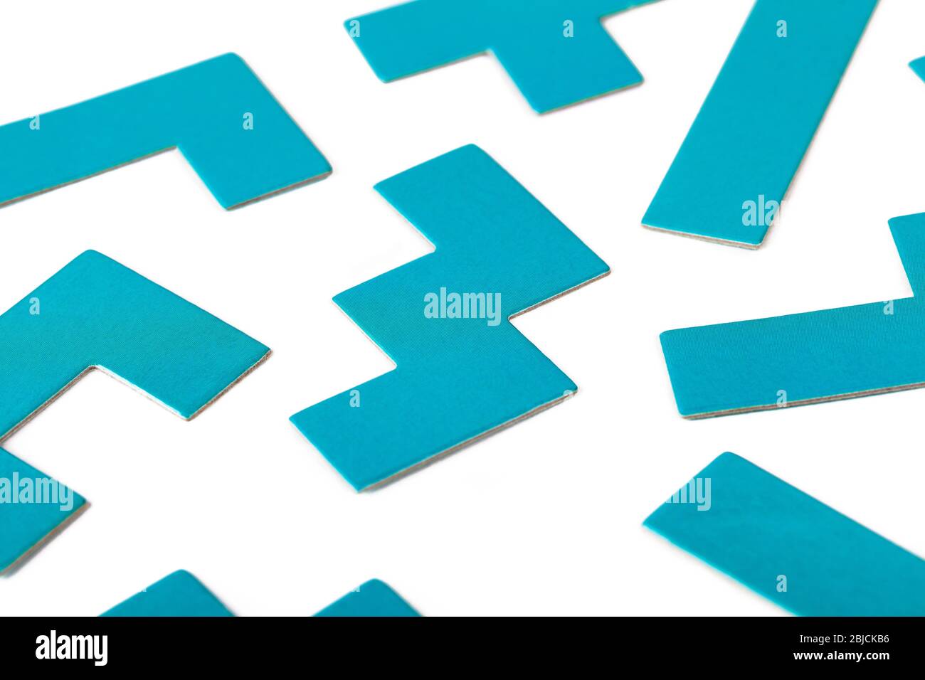 Various shapes, blue puzzle elements, pattern, white background ...