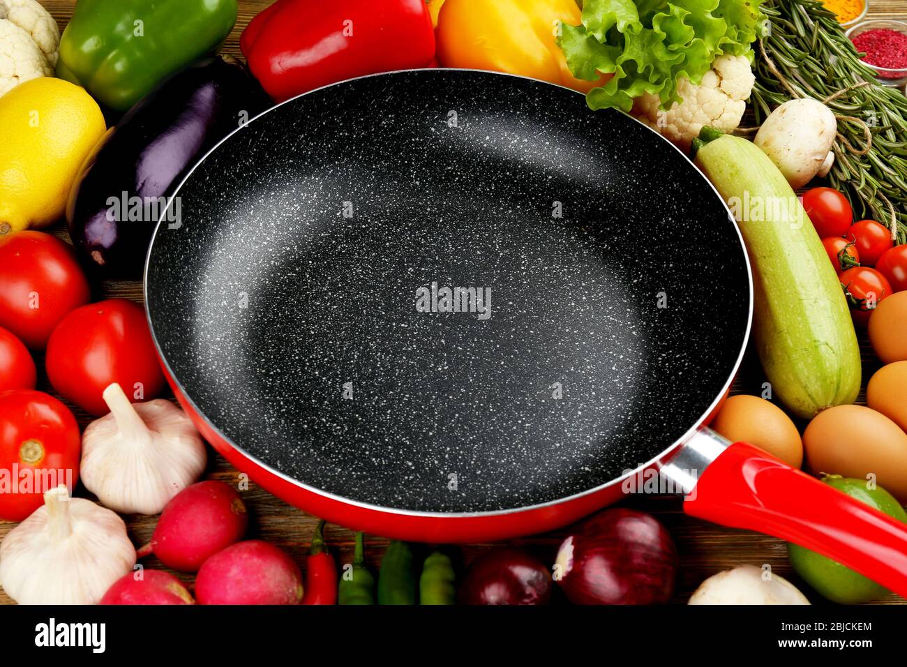 Frying pan with fresh ingredients Stock Photo - Alamy
