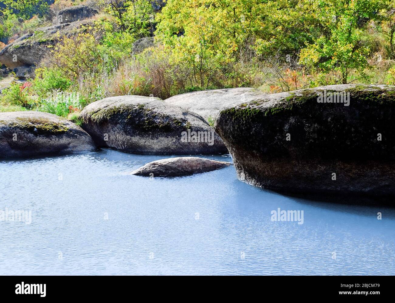 Beautiful background with water and stones Stock Photo - Alamy