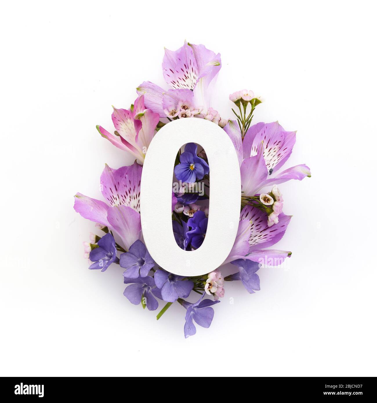 Creative layout with colourful flowers and number zero. Flat lay. Top ...