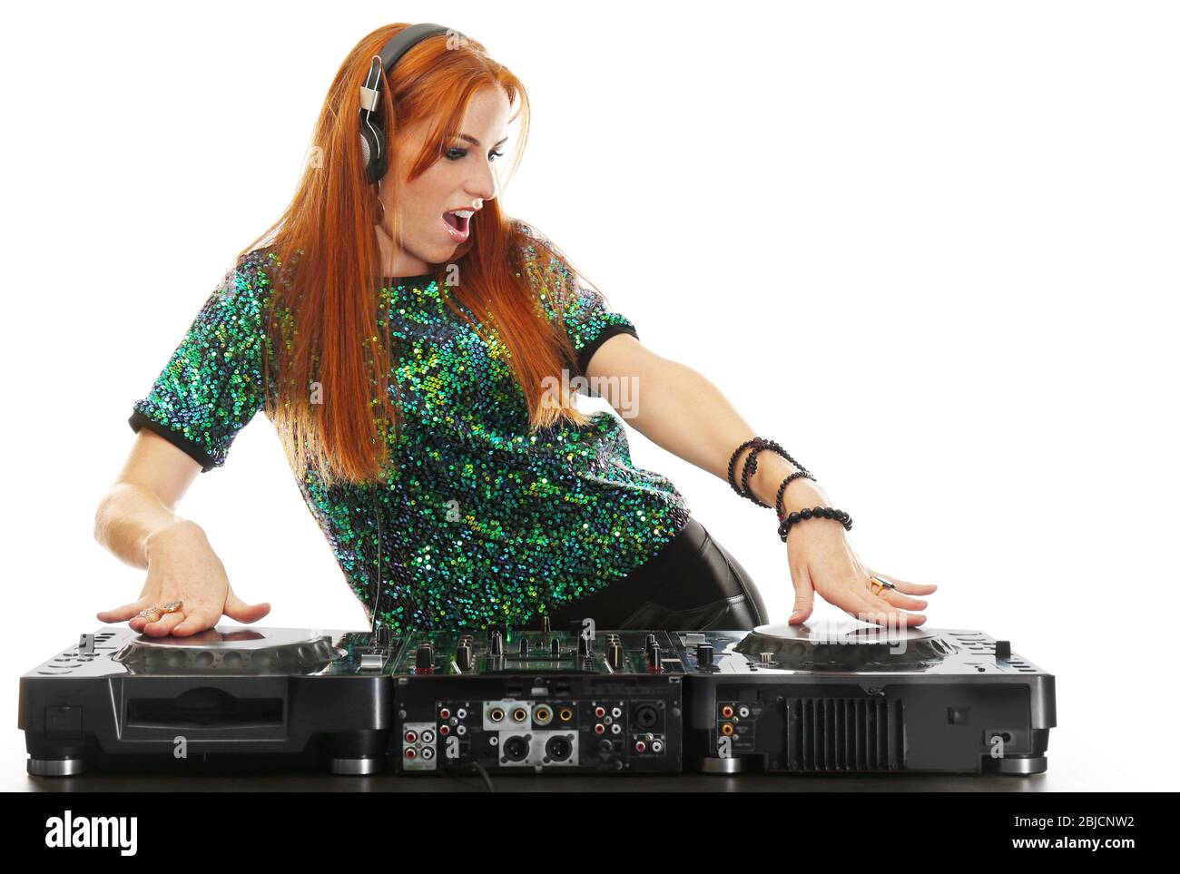 Beautiful female dj mixing music on white background Stock Photo - Alamy