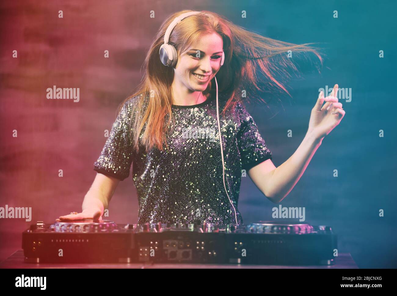 Female artist mixing techno hi-res stock photography and images - Alamy