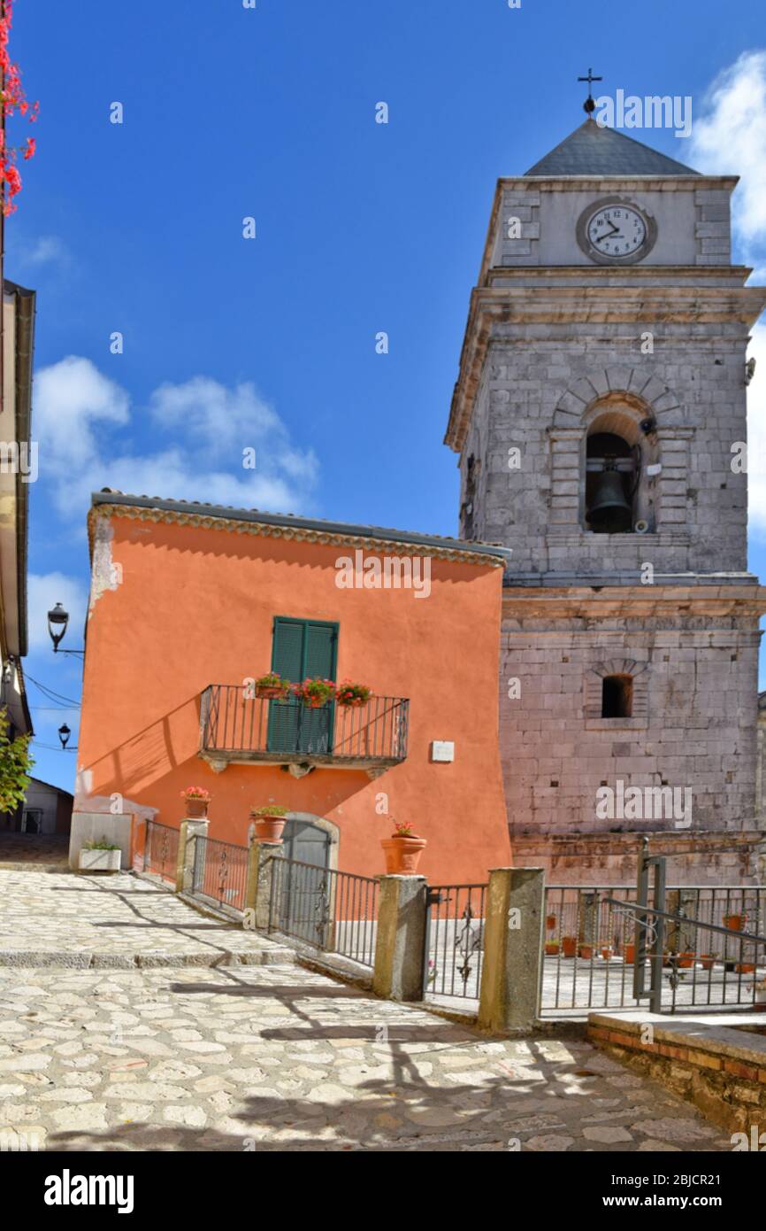 A small road between the houses of the village of Guardia Lombardi in ...
