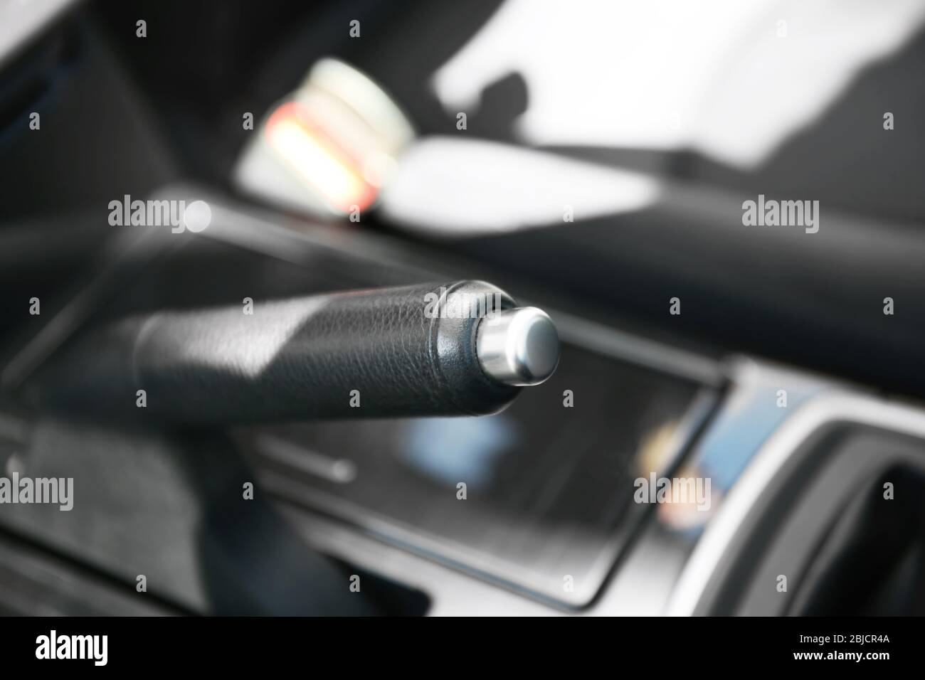 Hand brake of modern car, closeup Stock Photo - Alamy