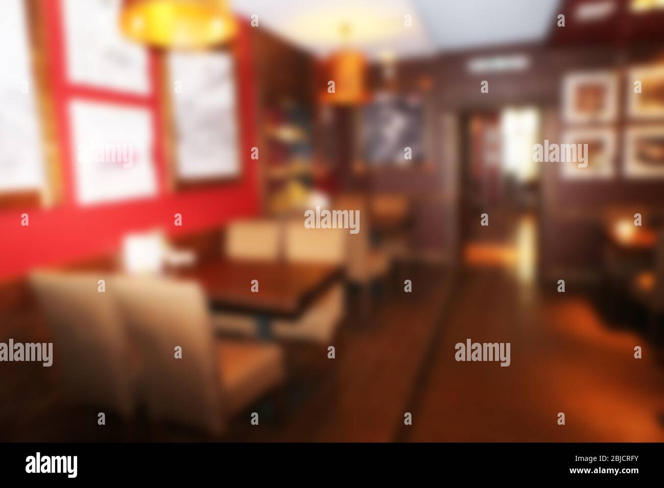 Blurred view of beautiful cafe interior Stock Photo - Alamy