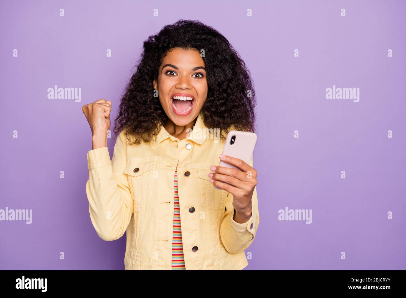 Photo of curly wavy brown haired excited crazy woman cheerful screaming ...