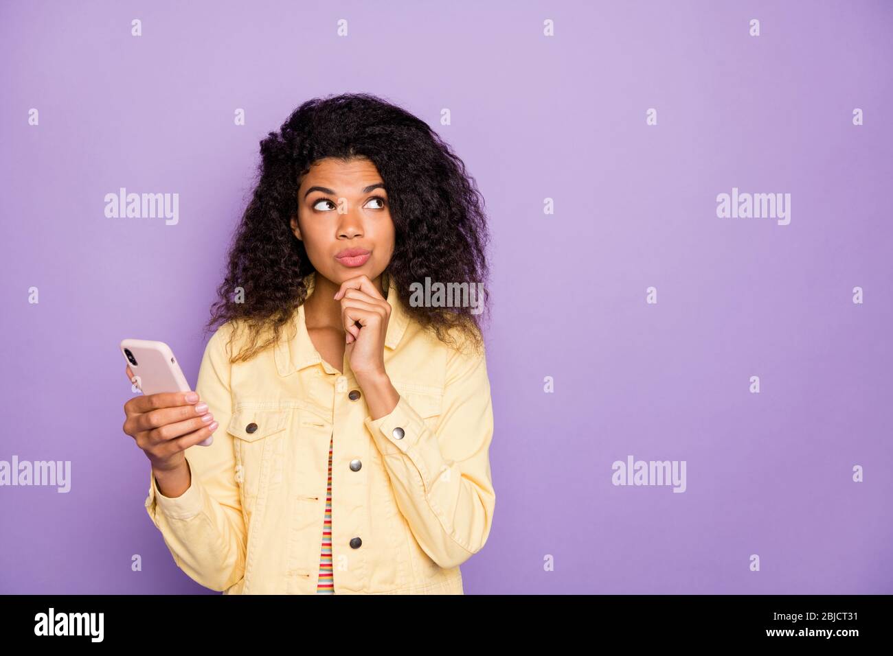 Photo Of Curly Brown Haired Attractive Bewildered Woman Remembering
