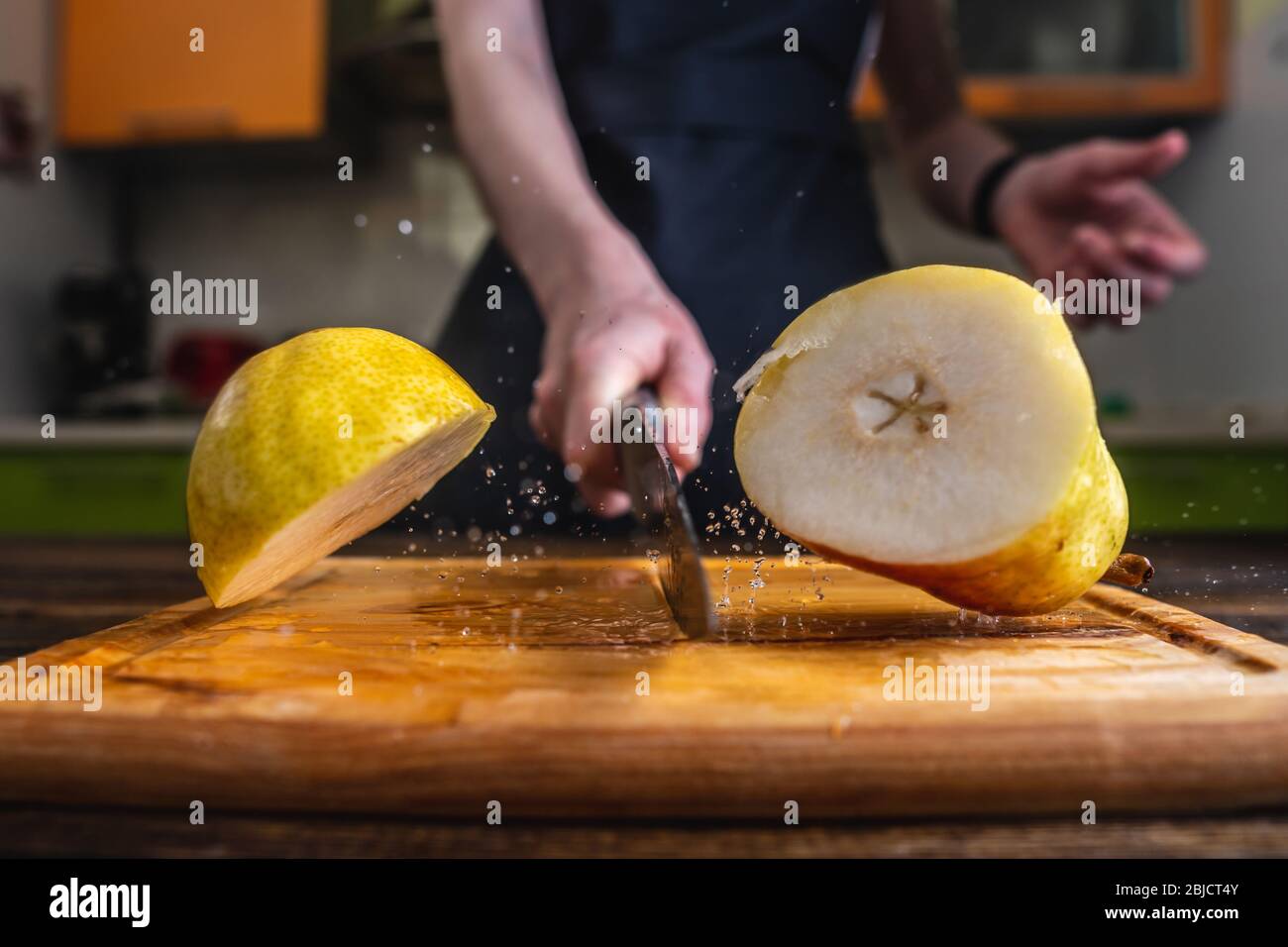 Pear in half hi-res stock photography and images - Alamy