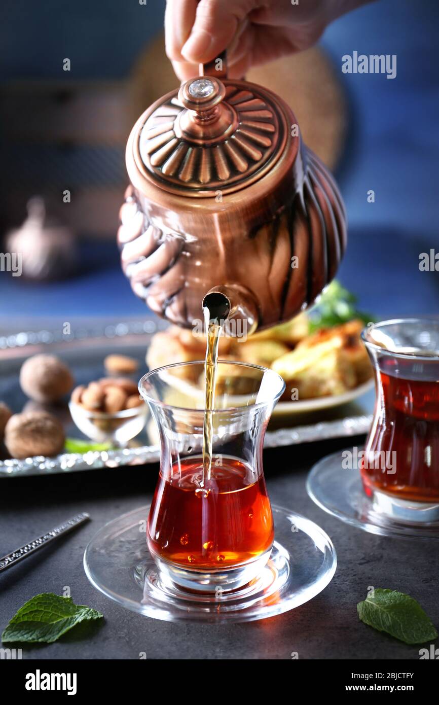 Pouring turkish tea glass hi-res stock photography and images - Alamy