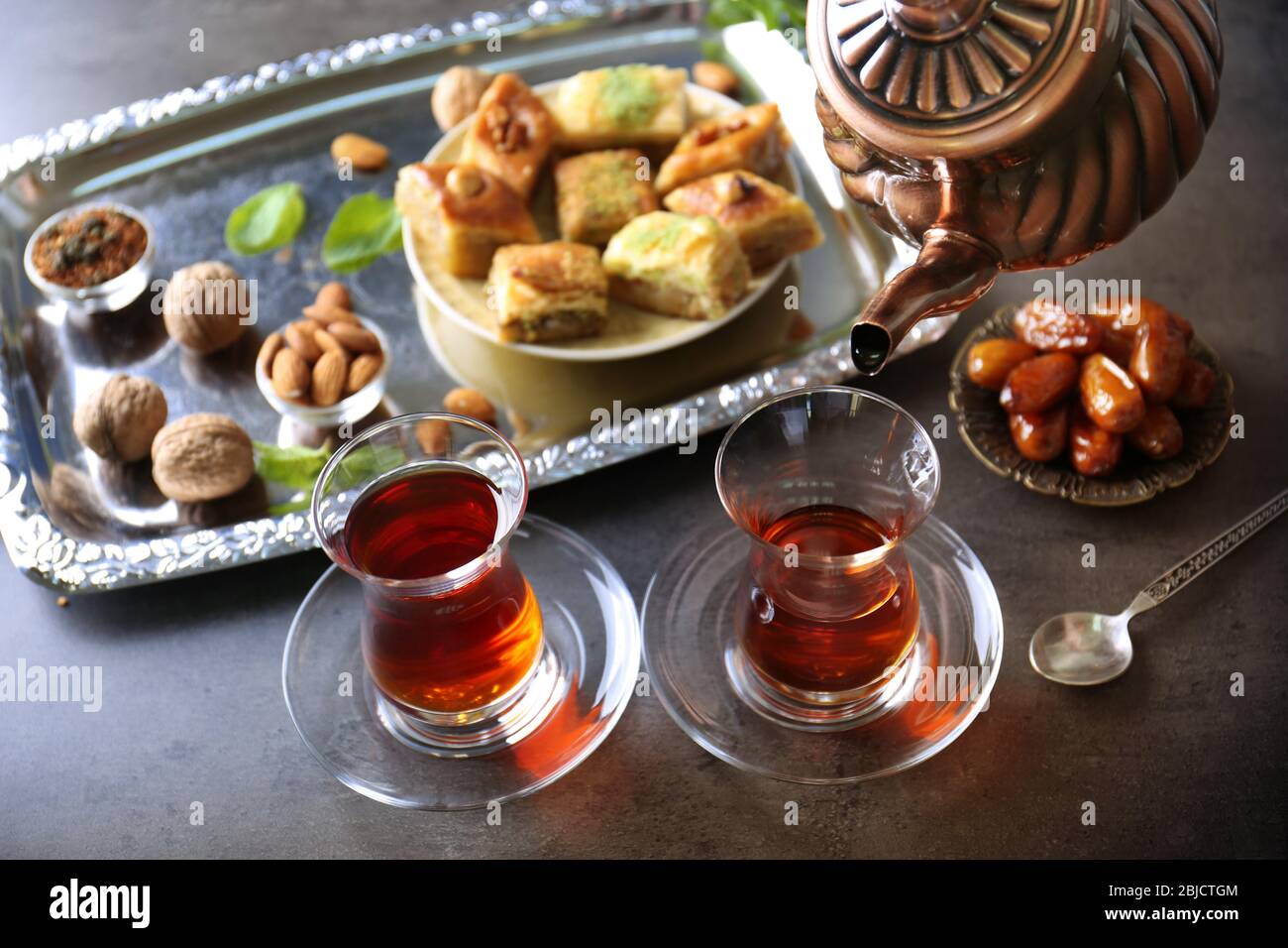 Pouring turkish tea glass hi-res stock photography and images - Alamy