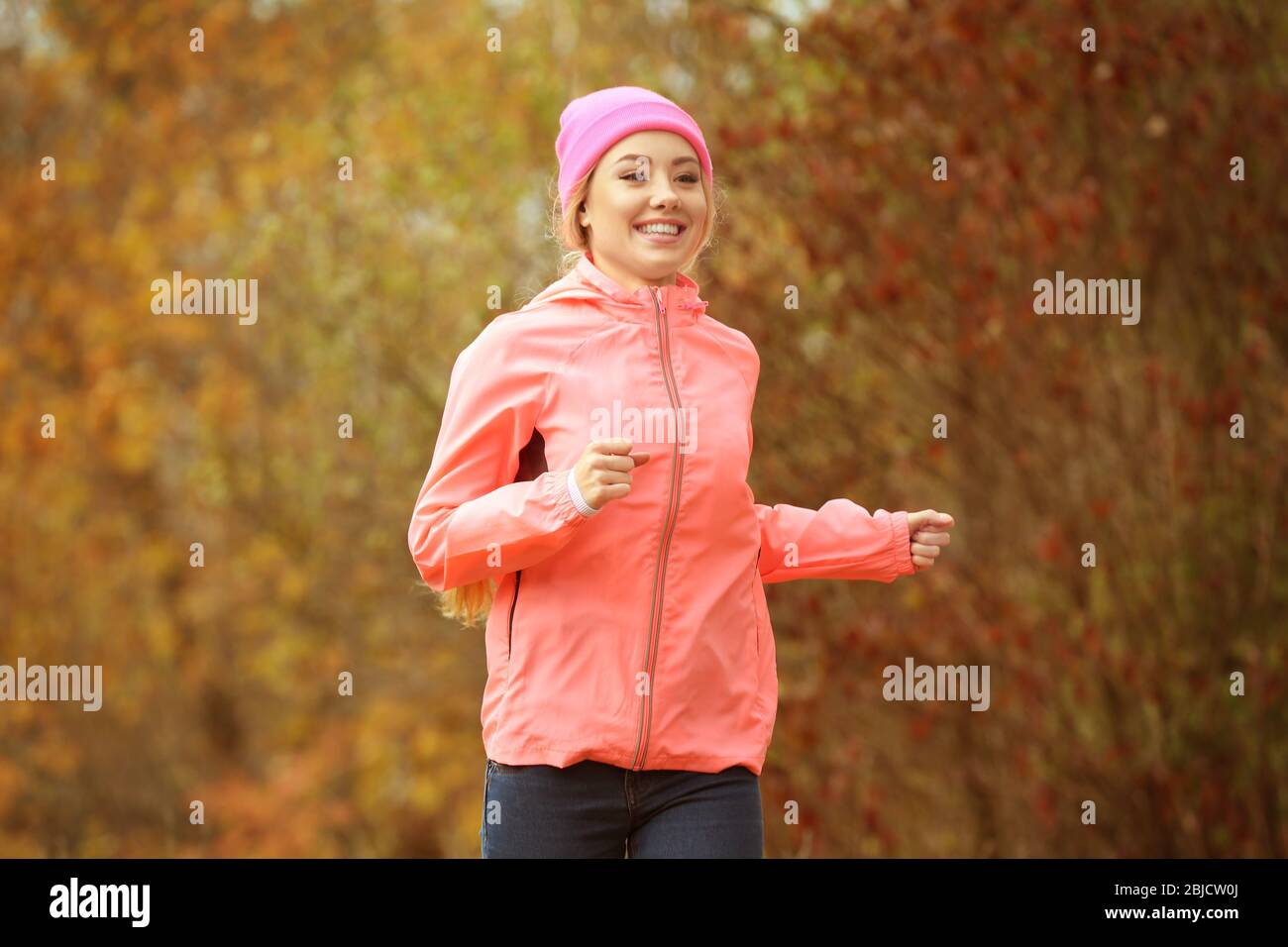 Girl in suit running hi-res stock photography and images - Alamy