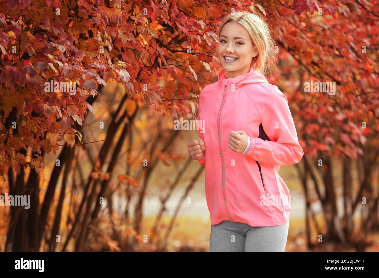 Girl in suit running hi-res stock photography and images - Alamy