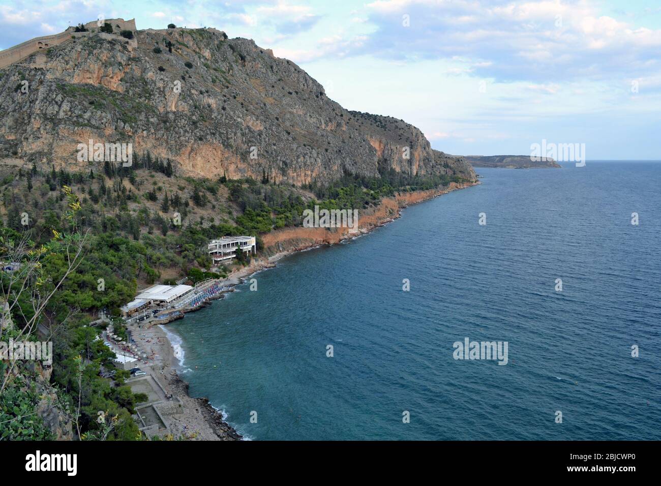 Arvanitia beach and Palamidi in Nafplio, Greece Stock Photo - Alamy