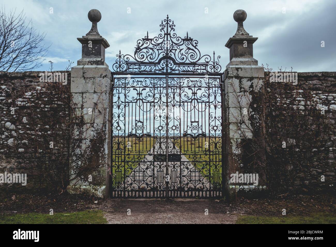 Gothic wrought iron fence gate hi-res stock photography and images - Alamy