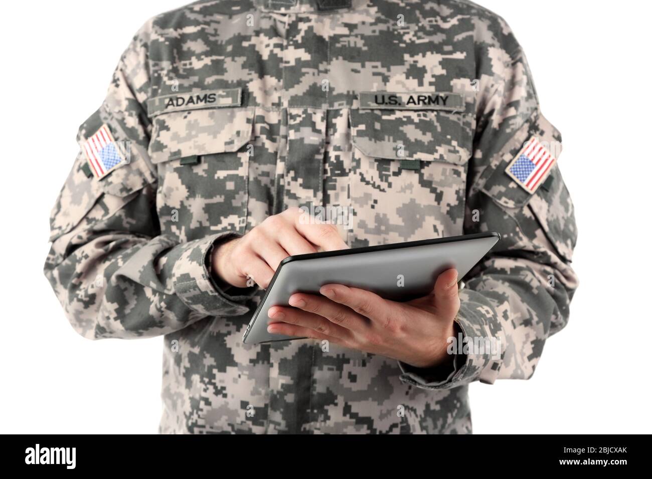 Soldier holding tablet. Military education concept Stock Photo - Alamy