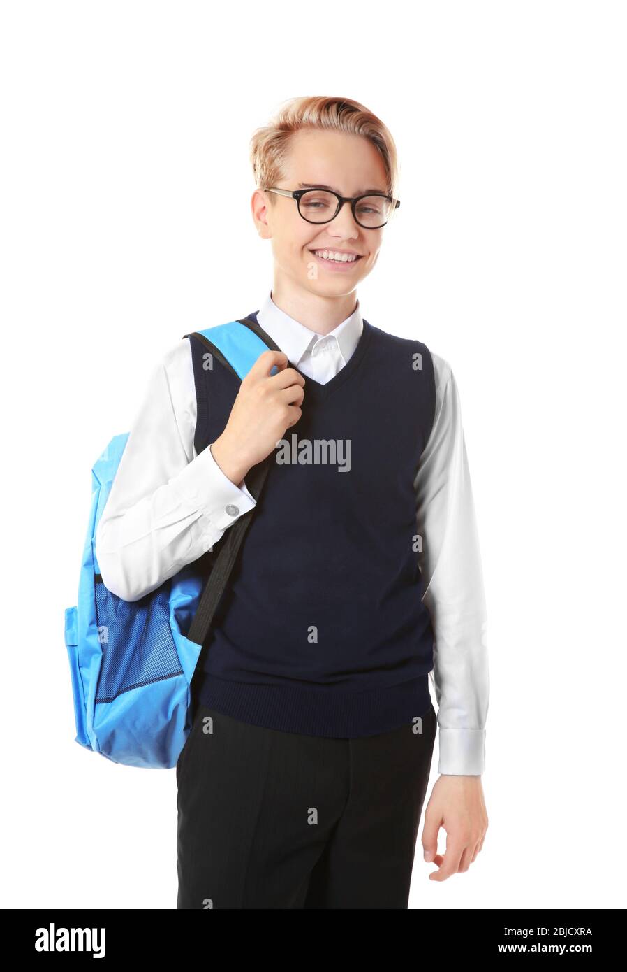 Teenage boy with backpack on white background Stock Photo - Alamy