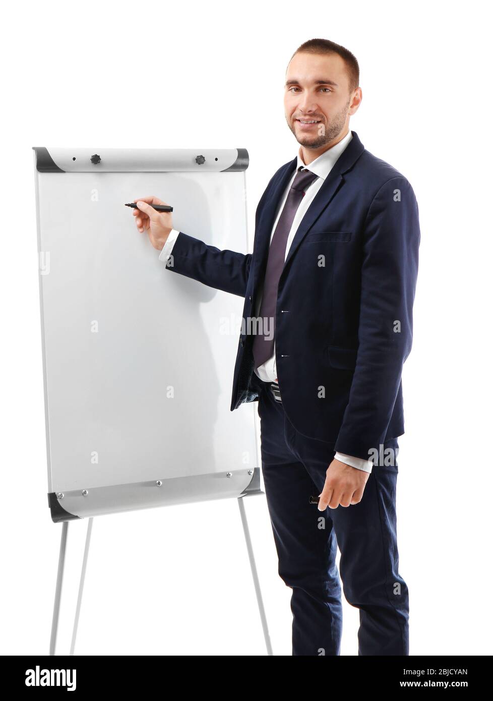 Businessman standing at flip chart Cut Out Stock Images & Pictures - Alamy Businessman standing at flip chart Cut Out Stock Images & Pictures - Alamy