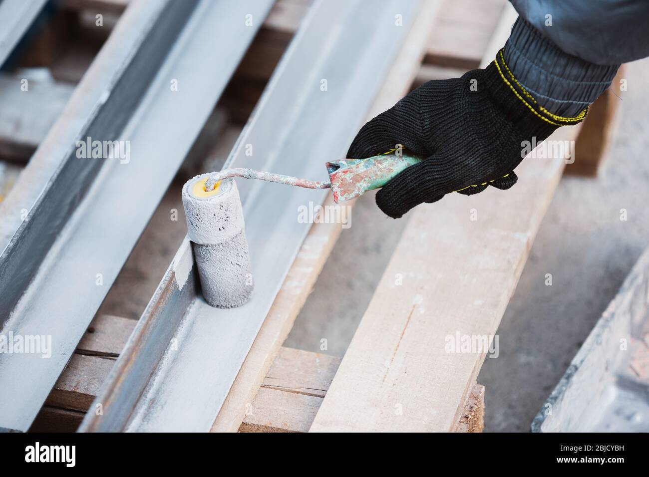 Closeup of repairman in uniform, professional builder working using ...
