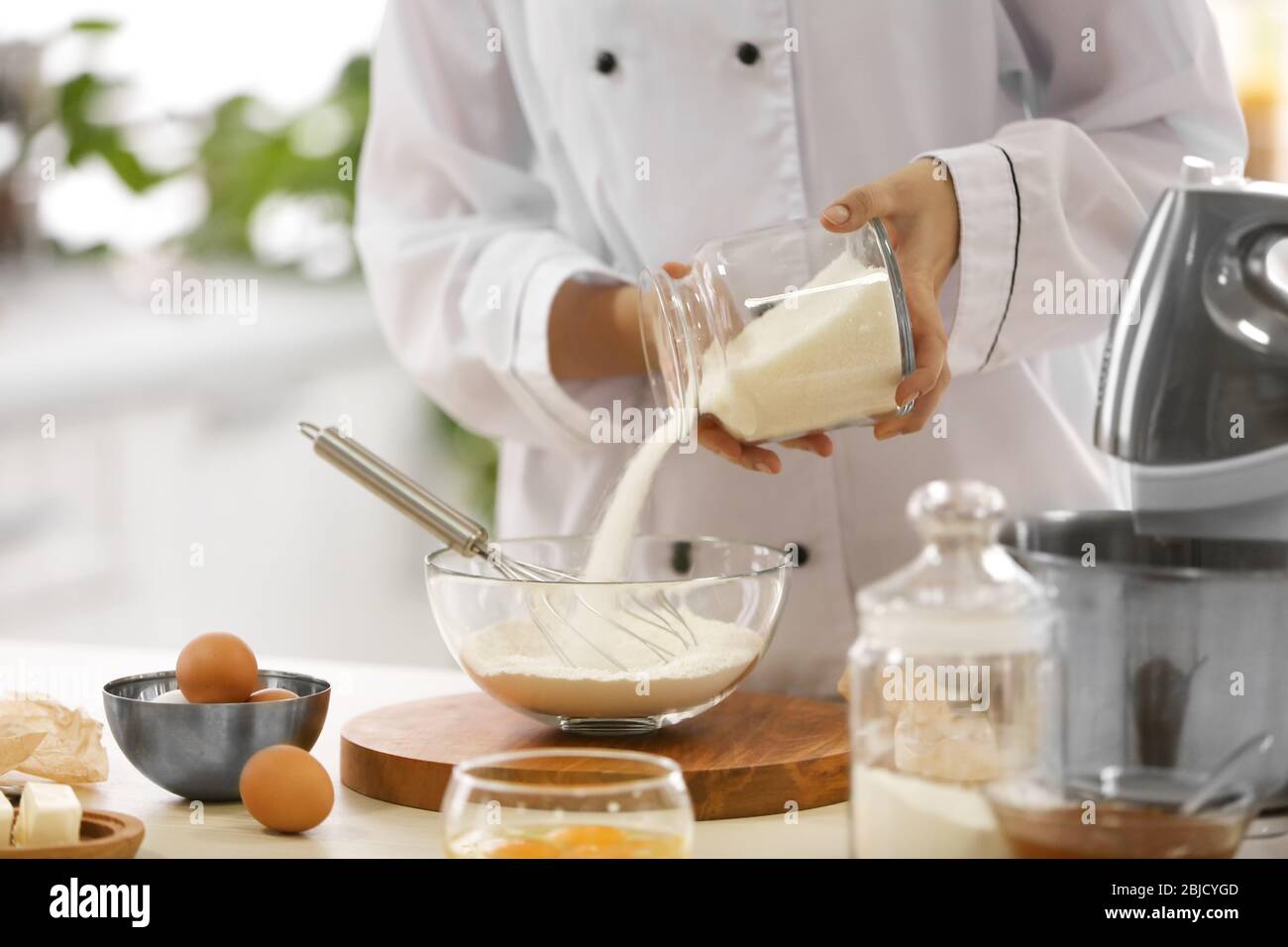 Professional female confectioner making dessert hi-res stock ...
