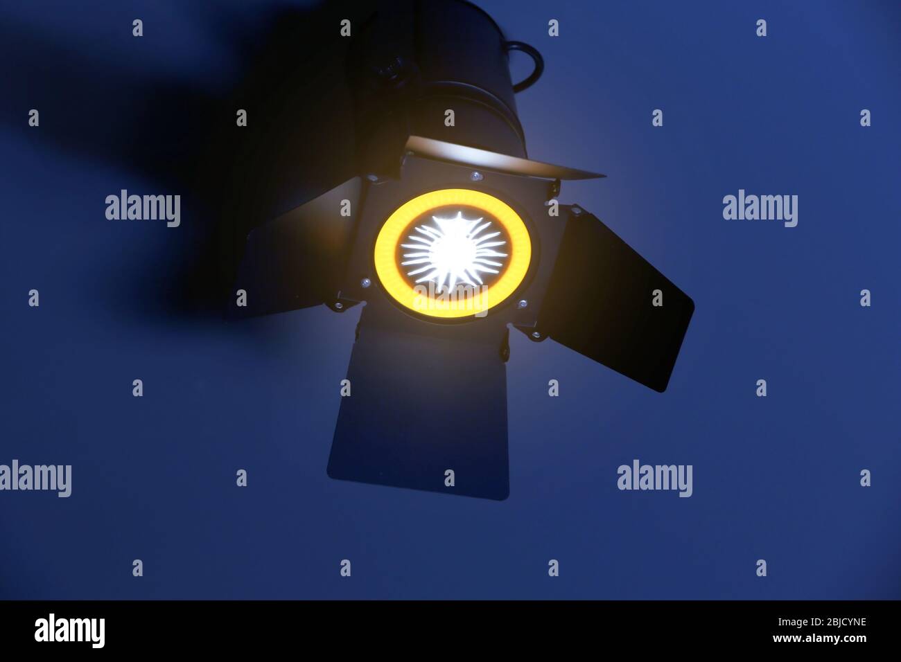 Electric spotlight in darkness Stock Photo - Alamy