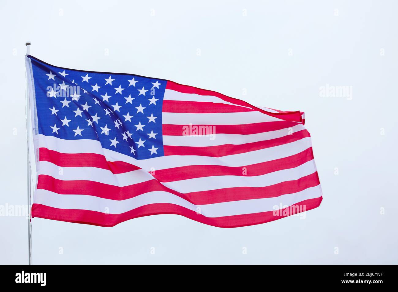 American flag grey sky hi-res stock photography and images - Alamy