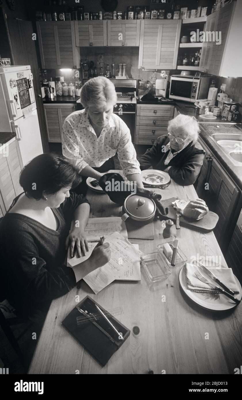 3 three generations busy living together under same roof hi-res stock ...
