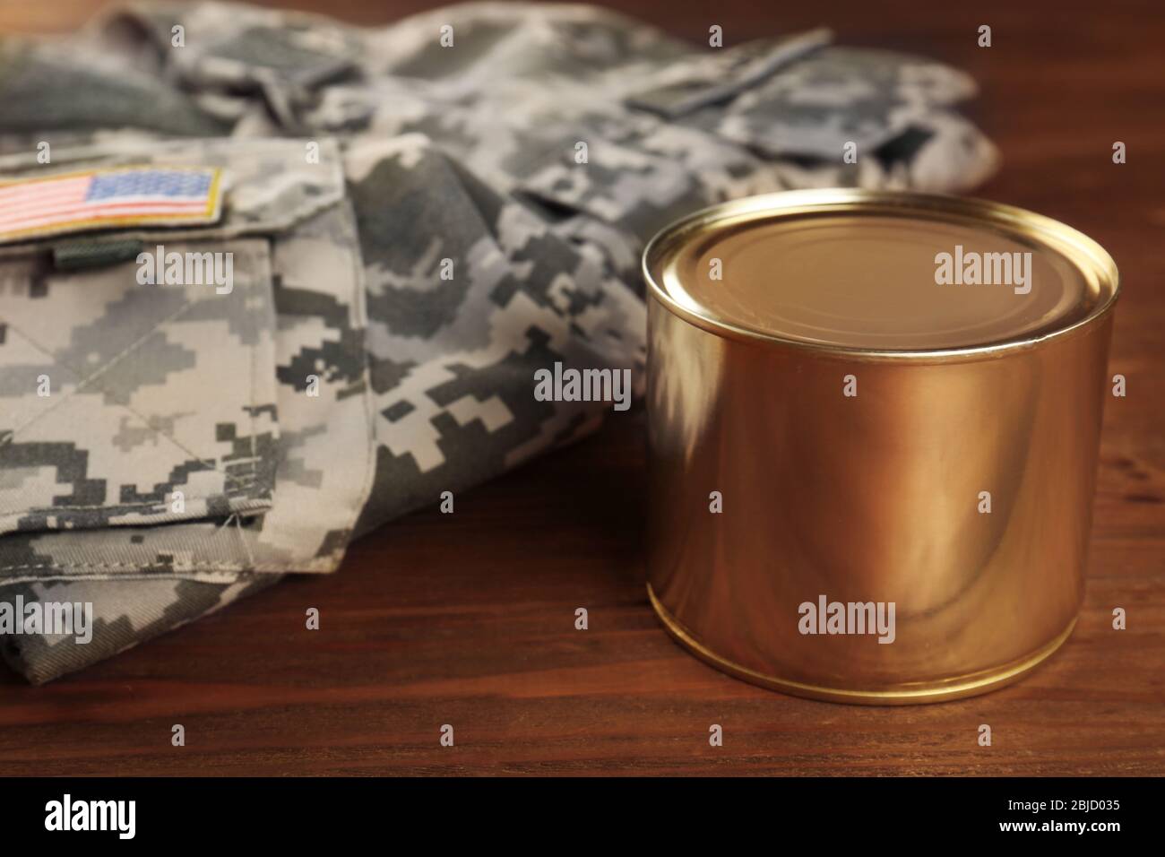 Uniform of American soldier and combat ration on wooden background ...