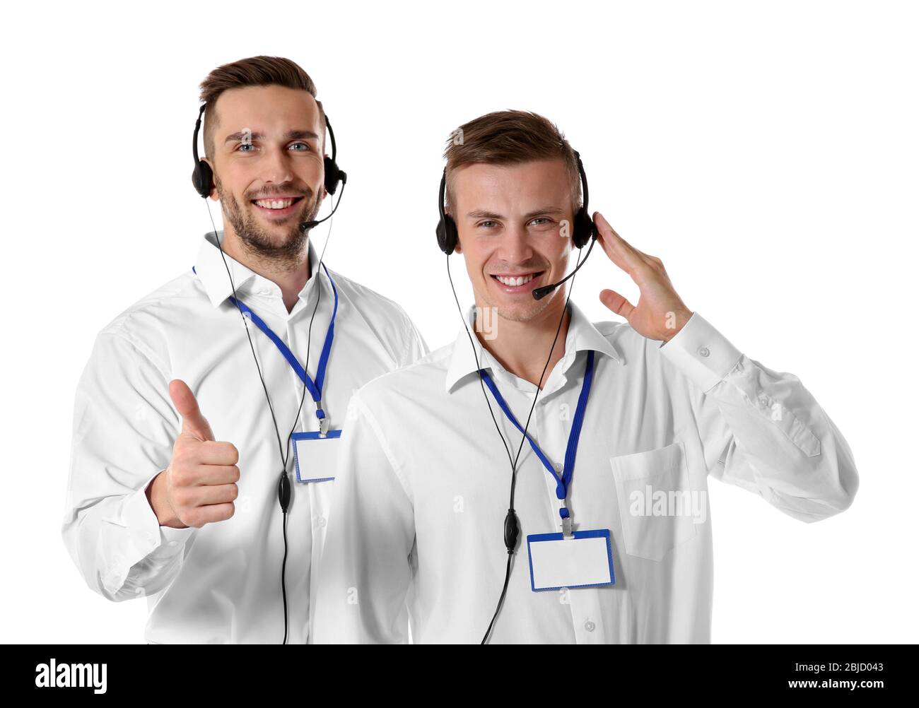 Young male technical support dispatchers on white background Stock ...