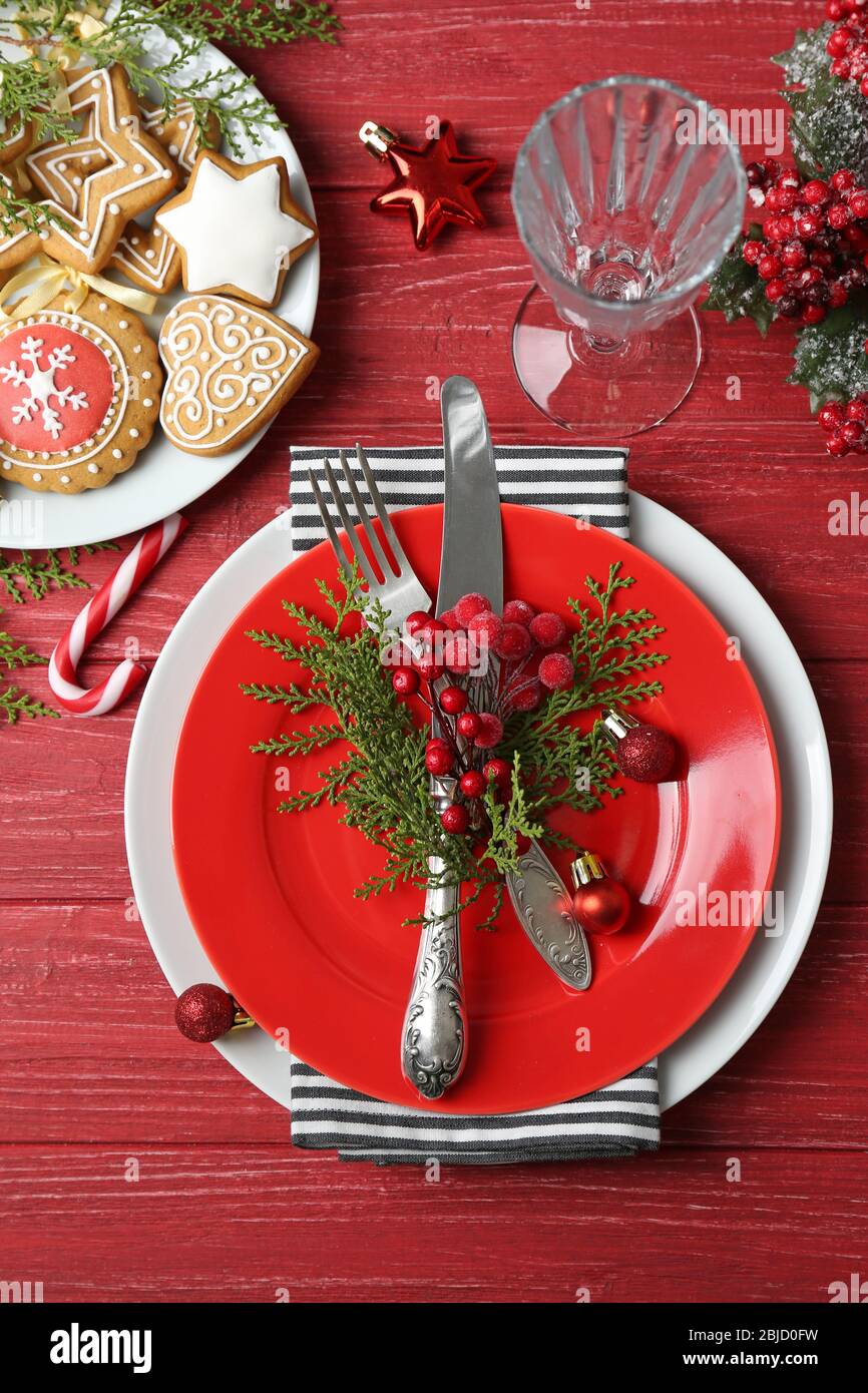 Beautiful Christmas table setting with decorations Stock Photo - Alamy