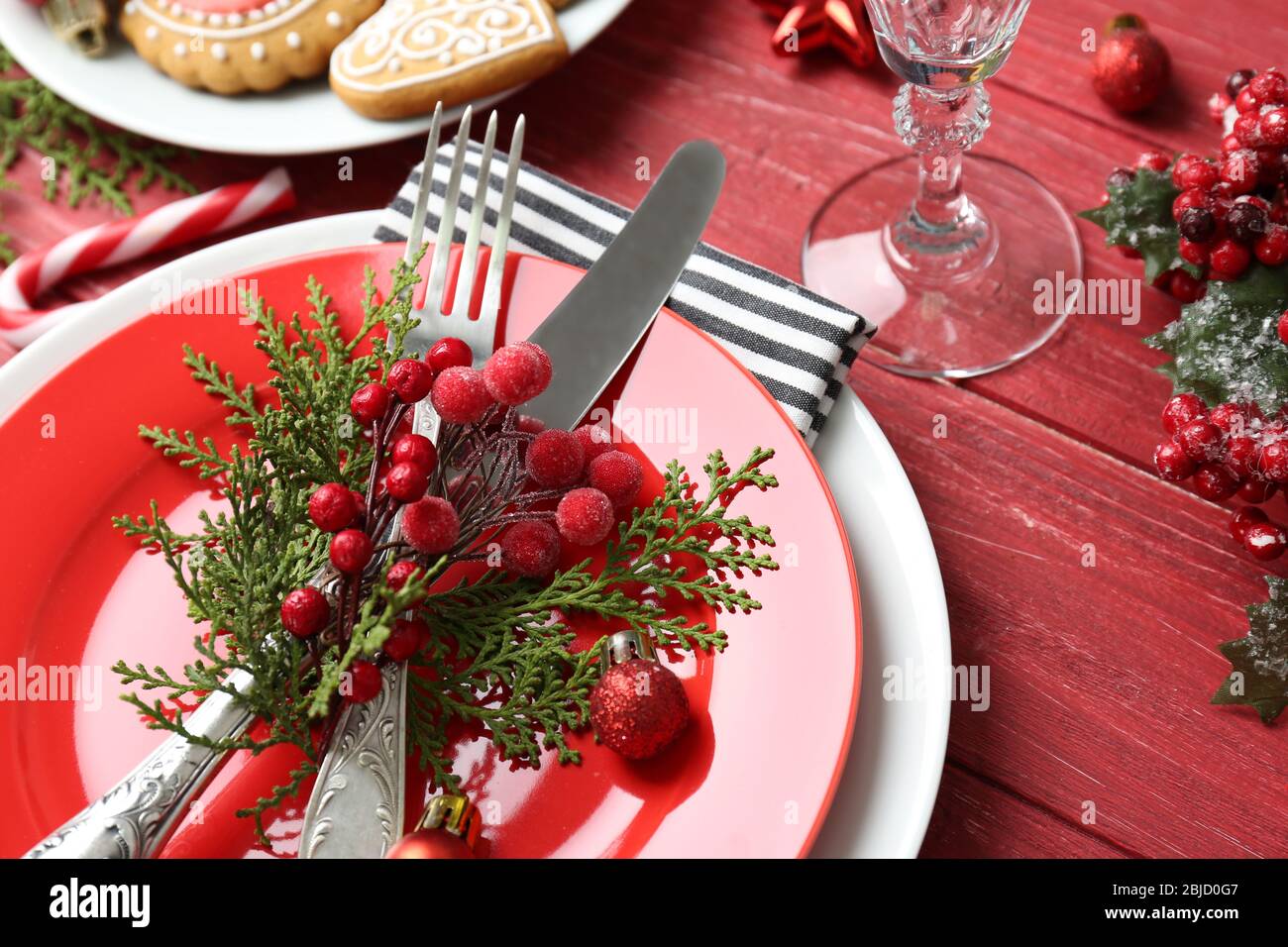 Beautiful Christmas table setting with decorations Stock Photo - Alamy