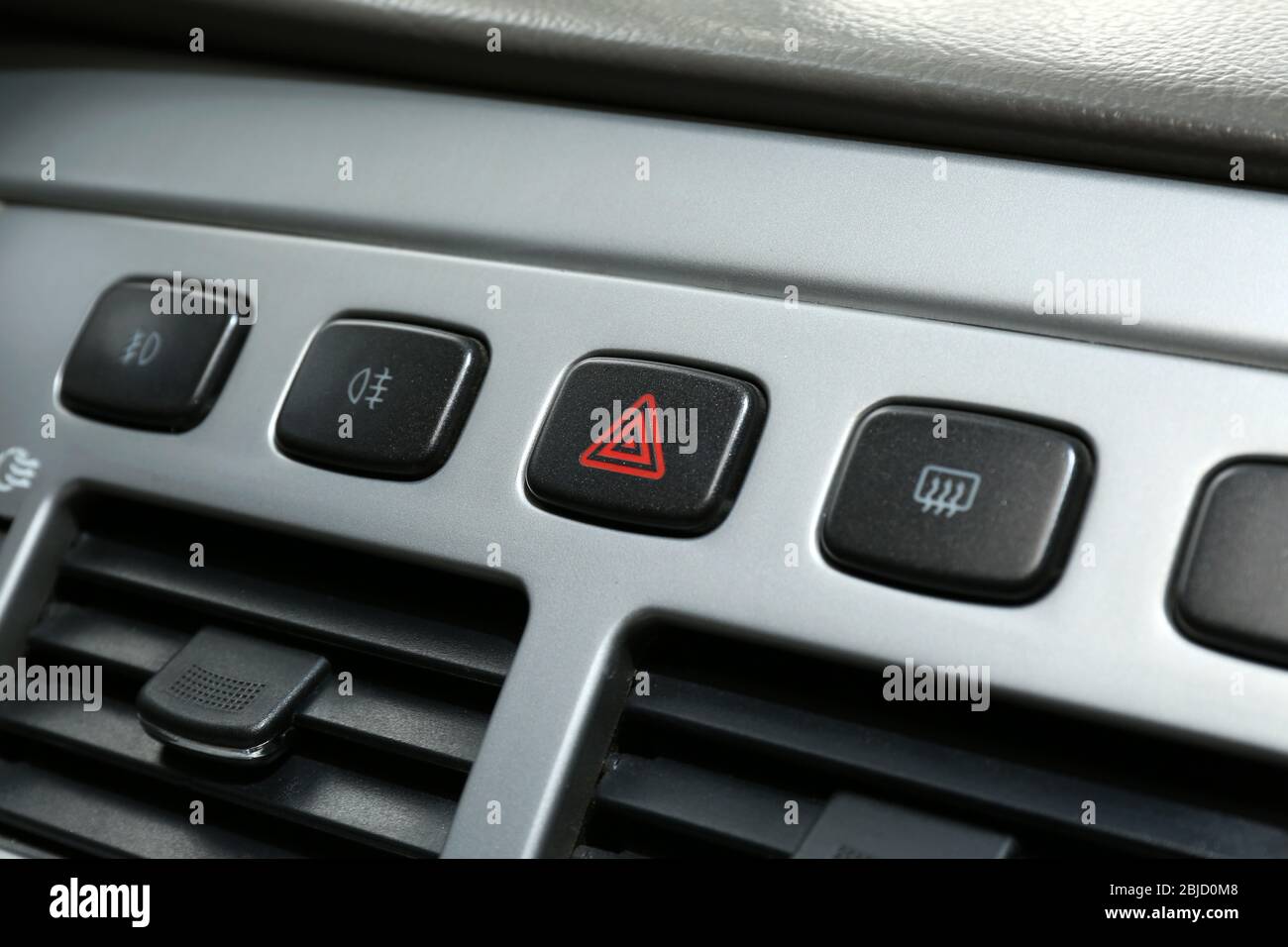 Emergency warning button on car console, closeup Stock Photo - Alamy
