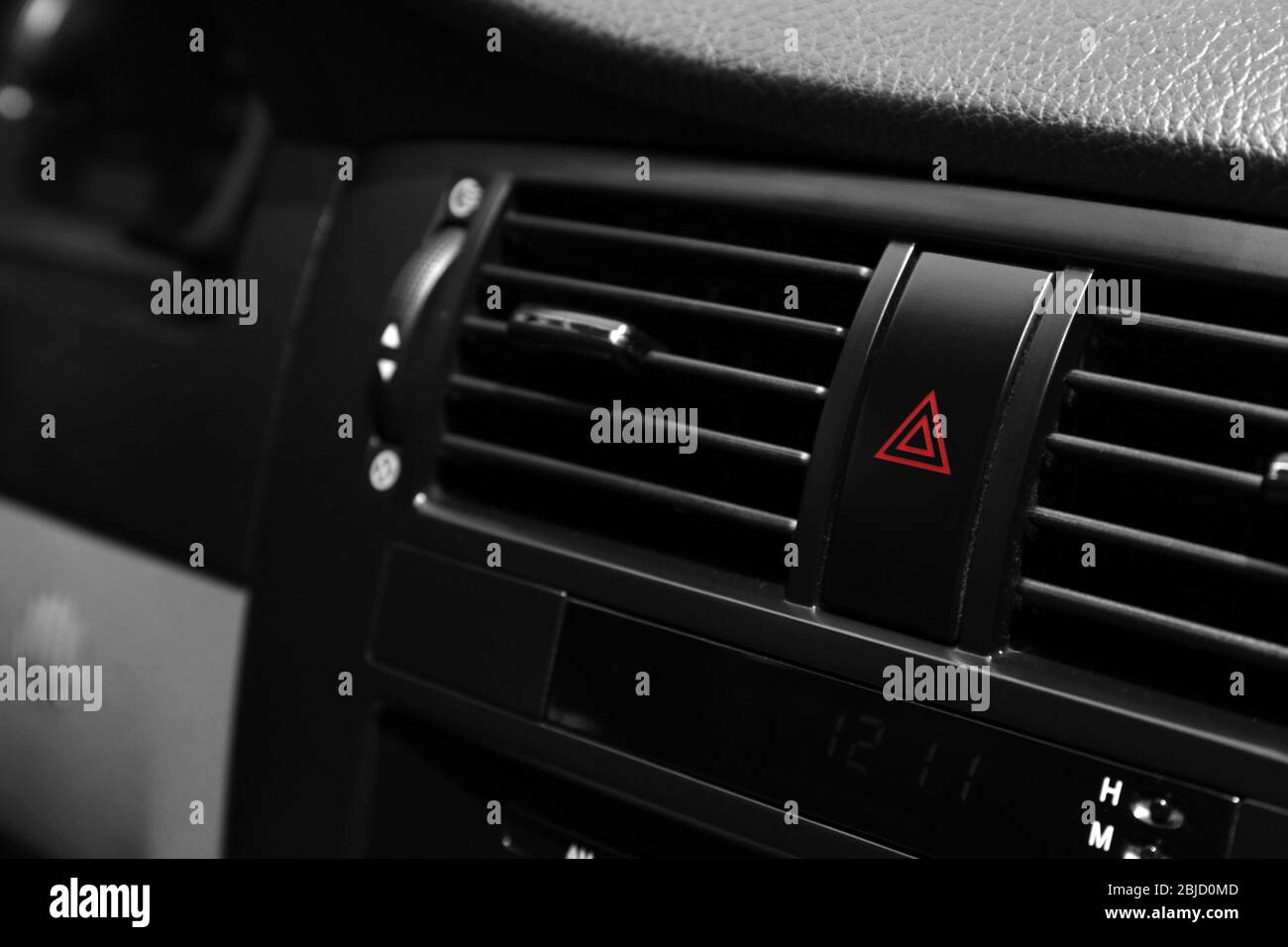 Emergency warning button on car console, closeup Stock Photo - Alamy