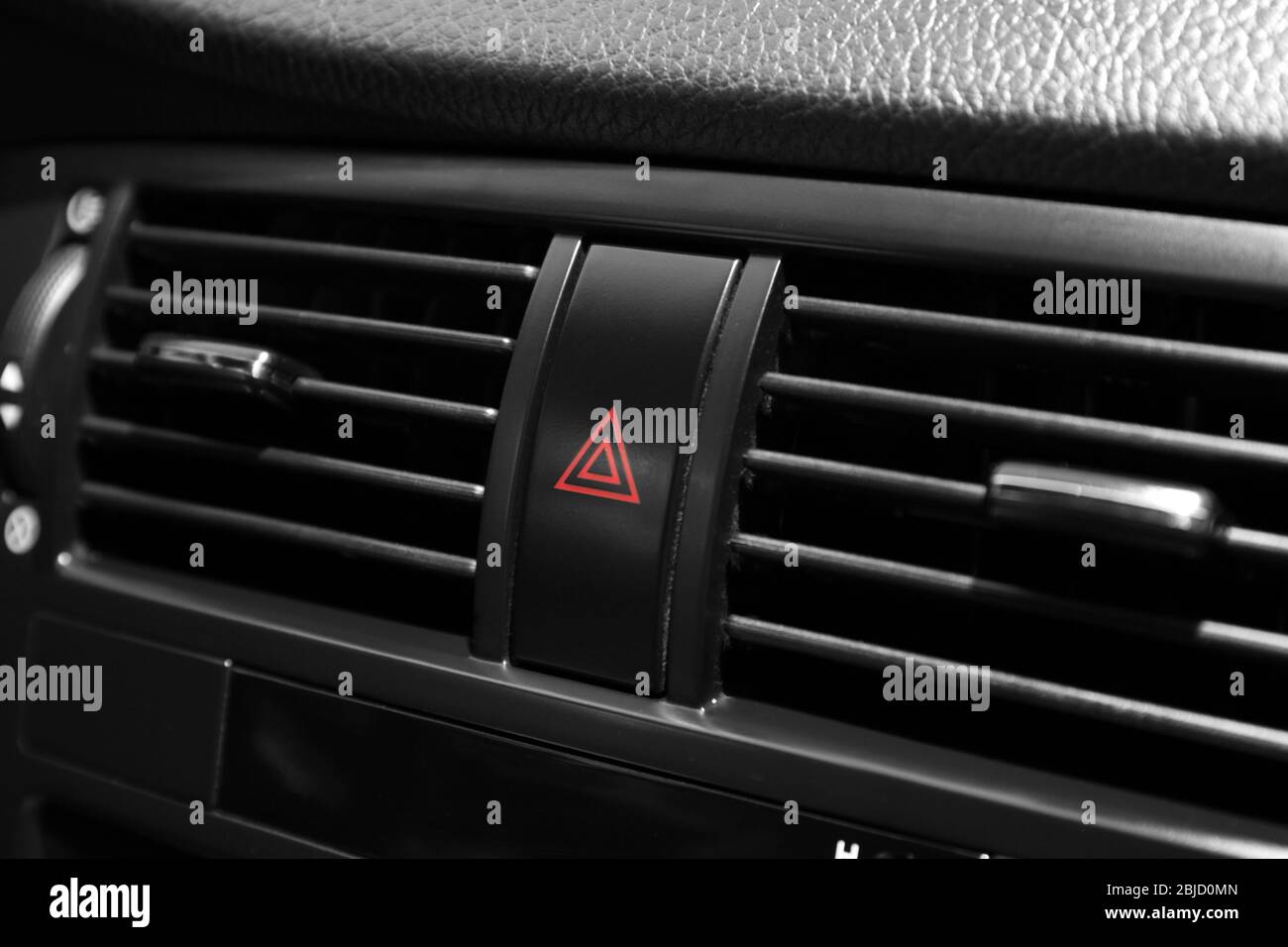 Emergency warning button on car console, closeup Stock Photo - Alamy