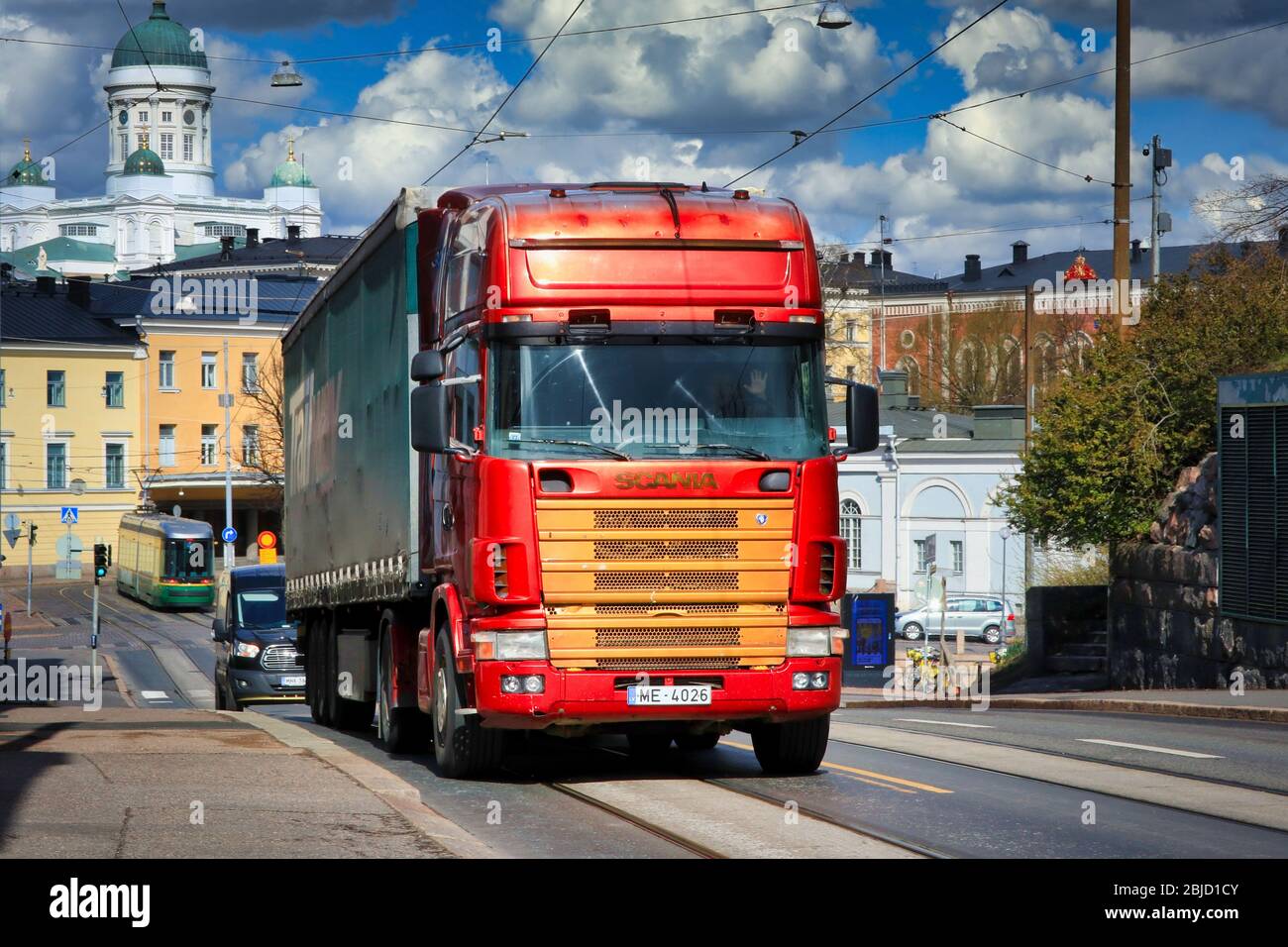 Red and gold 4-series Scania truck pulling semi trailer to Katajanokka ...