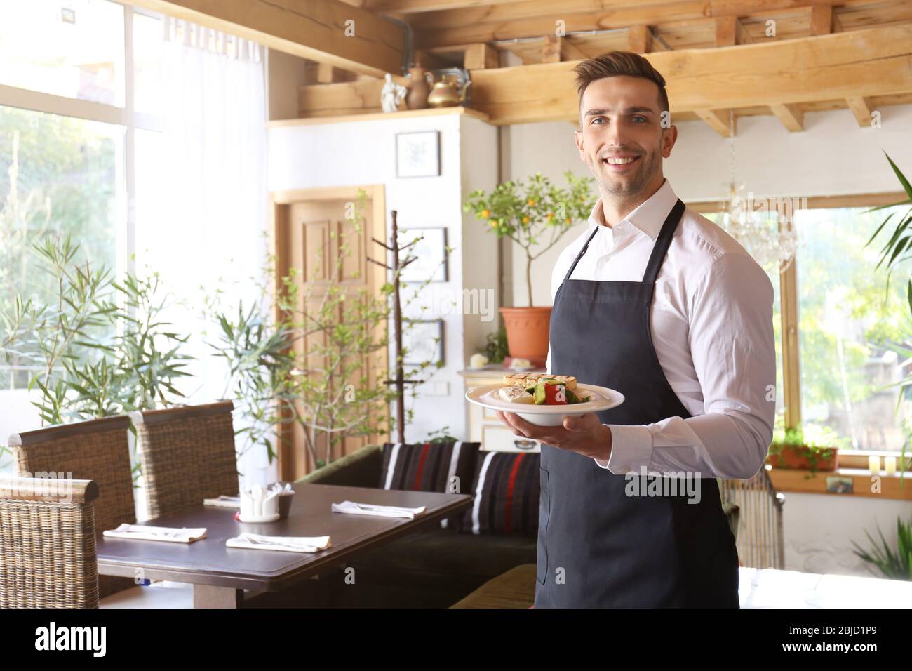 Serving meals hi-res stock photography and images - Alamy
