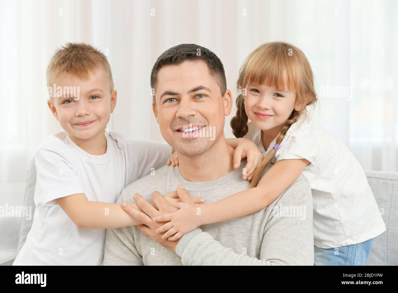 Happy father with children, closeup Stock Photo - Alamy